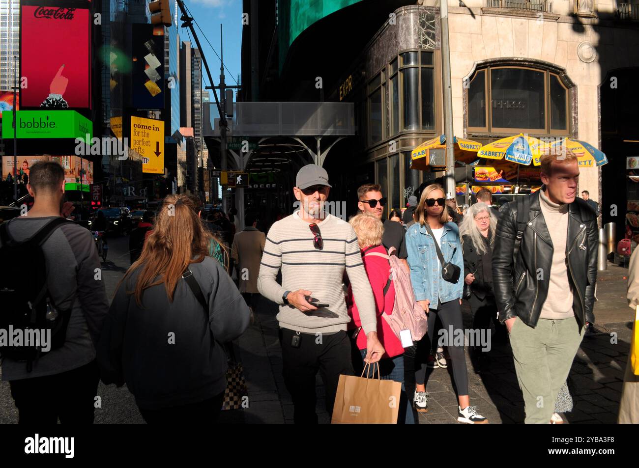 People walk through Times Square, Manhattan, New York City Stock Photo ...