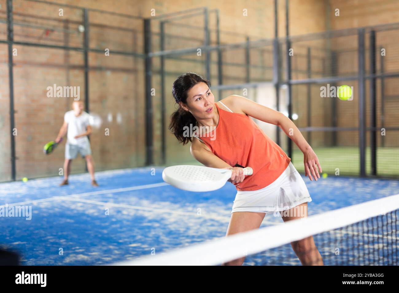 Asian girl with passion play padel closeup Stock Photo - Alamy