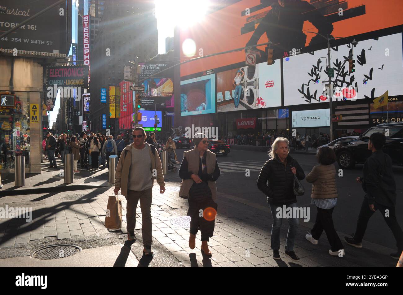 People walk through Times Square, Manhattan, New York City Stock Photo ...