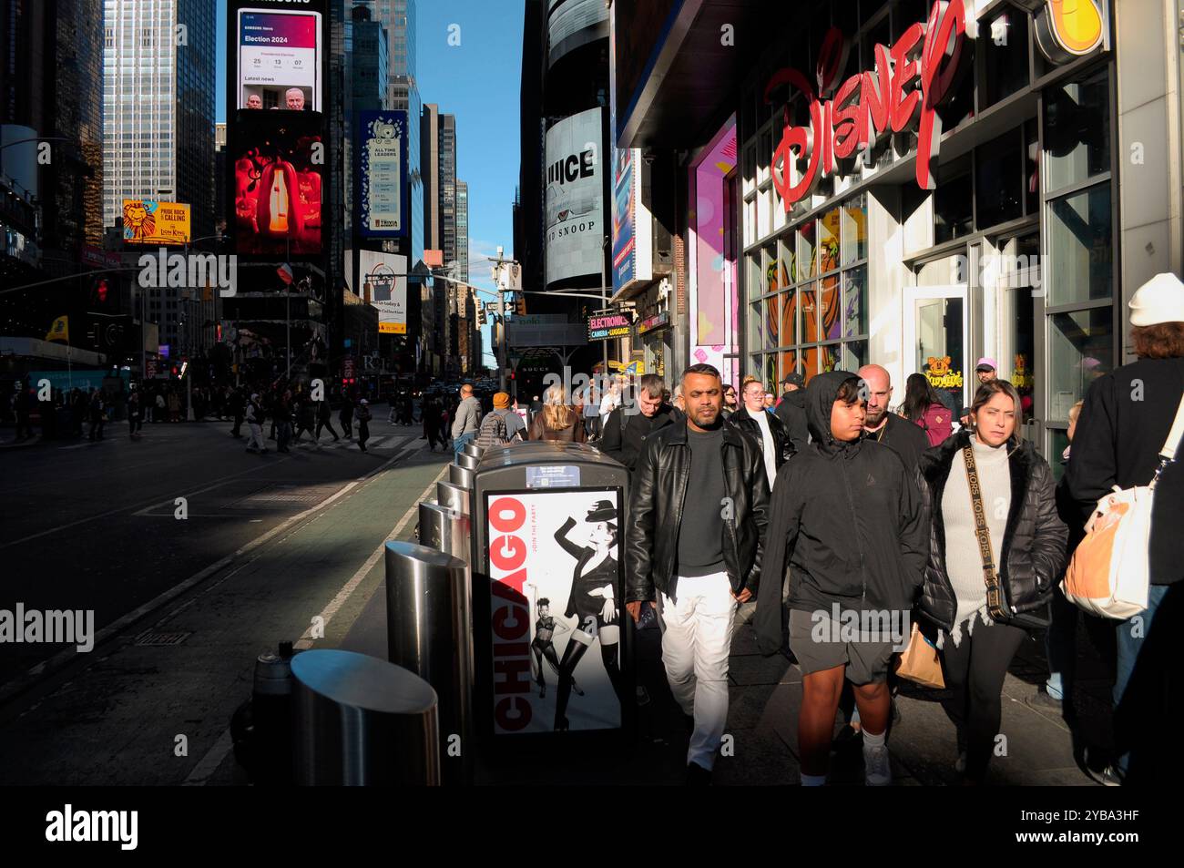 People walk through Times Square, Manhattan, New York City Stock Photo ...