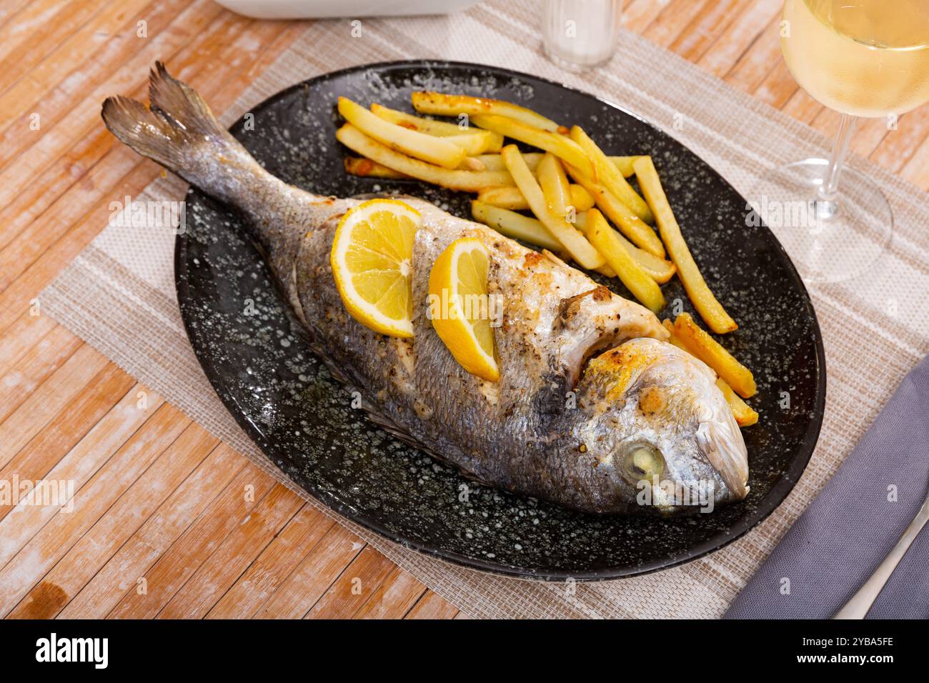 Dorado fish on baking sheet hi-res stock photography and images - Alamy