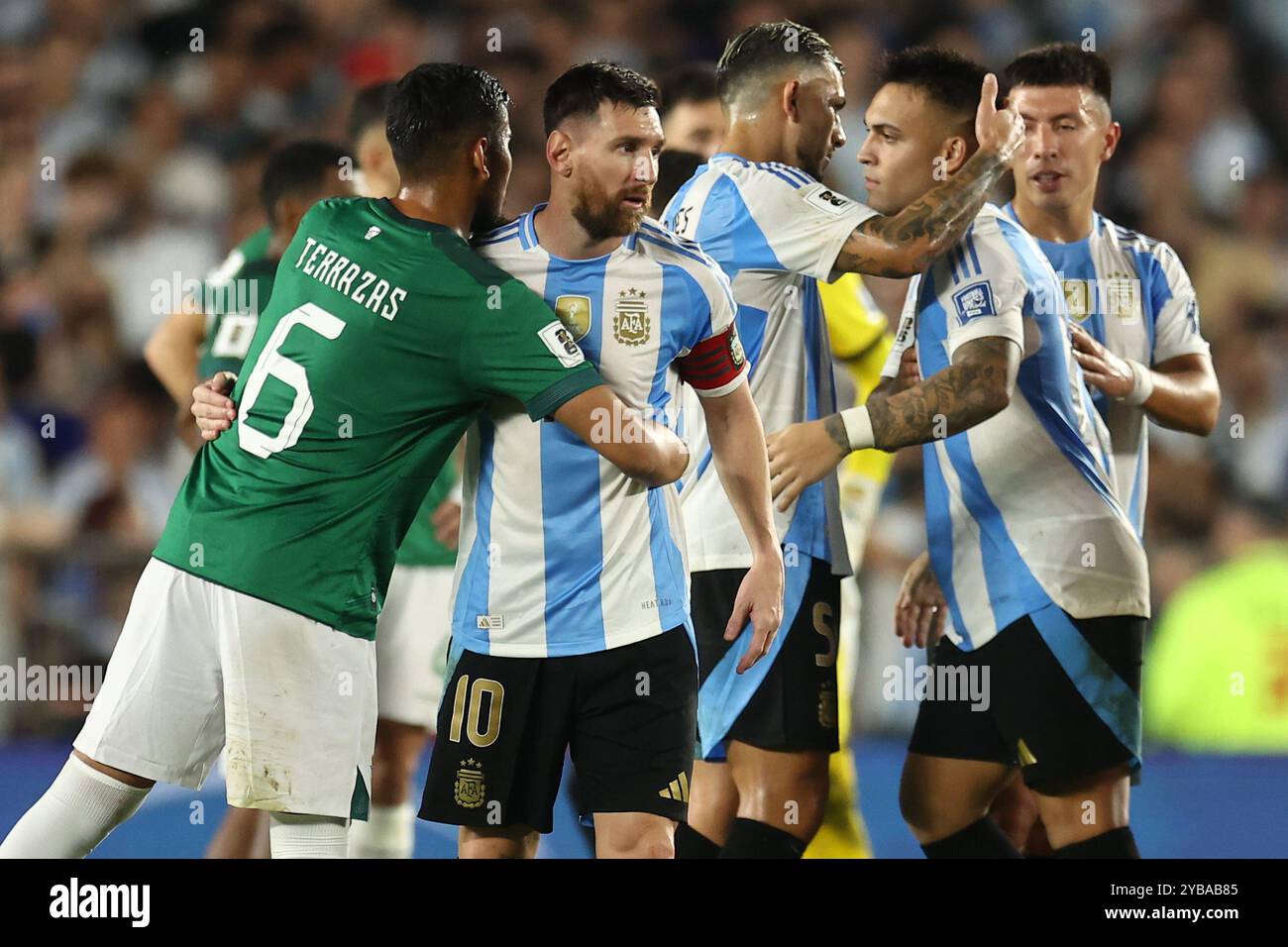 Argentina's forward Lionel Messi (C) greets Bolivia's midfielder Adalid ...