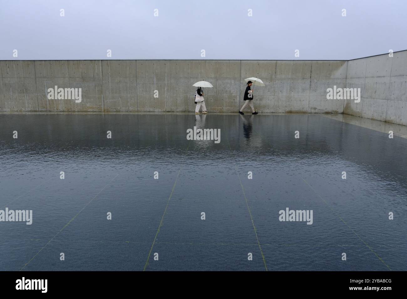 The reflecting pool of the Buddha statue in the Hill of the Buddha,the ...