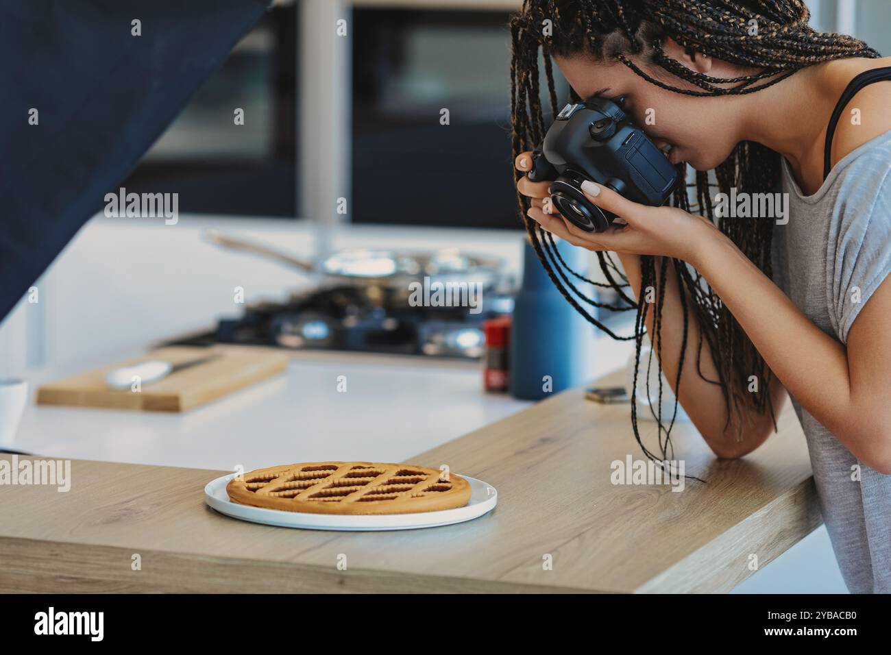 Photographer captures a delicious pie in a modern kitchen, showing the ...