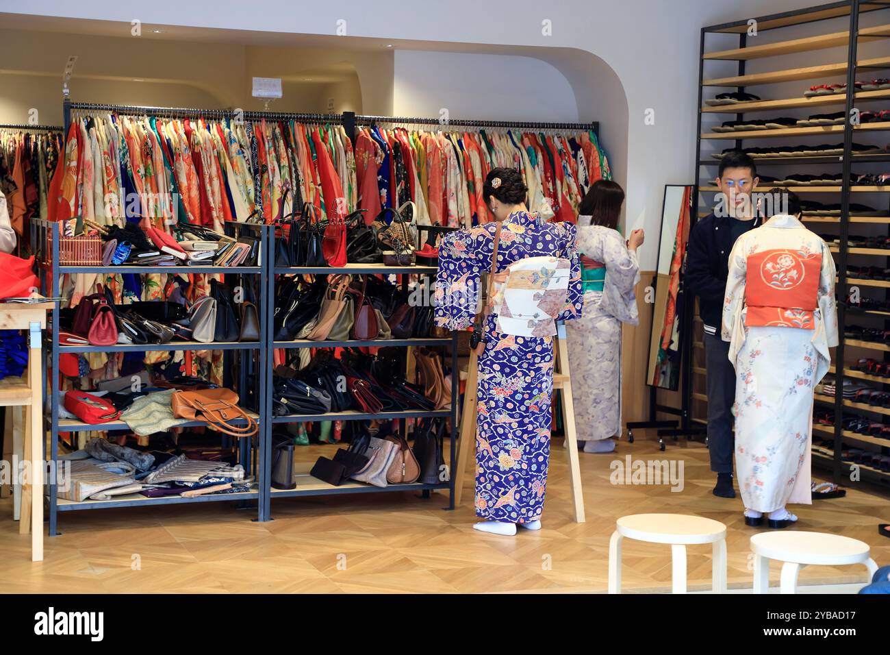 Female customers trying on traditional Japanese Kimonos on a Kimono ...