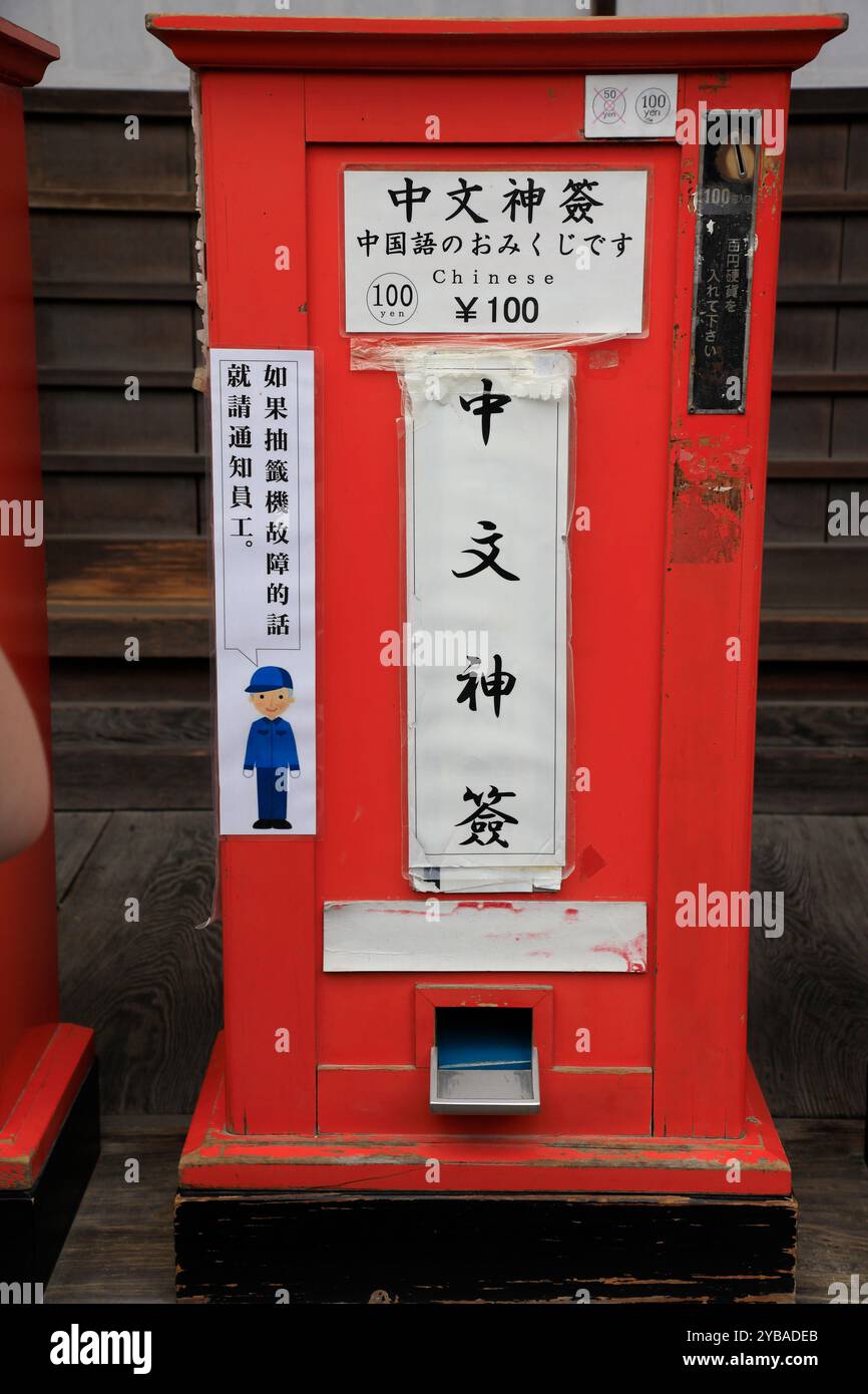 Coin-operated fortune teller machine will give the result in Chinese ...