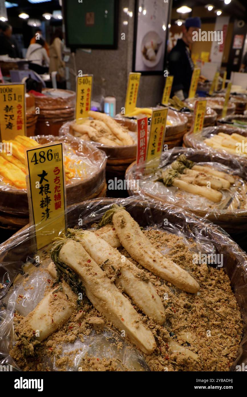 Traditional pickled radishes displaying in a traditional pickle shop in ...
