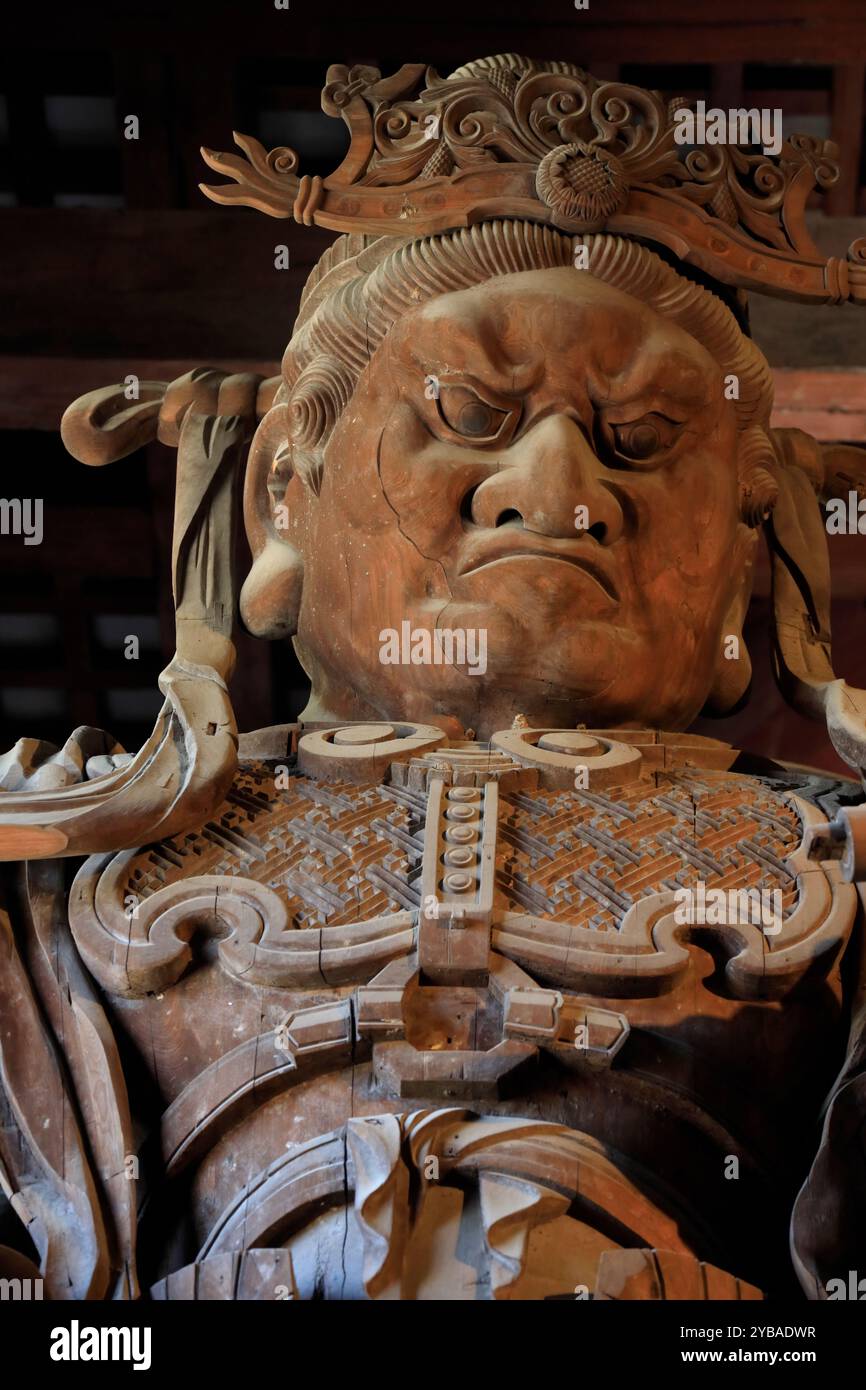 A closed up view of wooden statue of Komokuten in the Great Buddha Hall ...