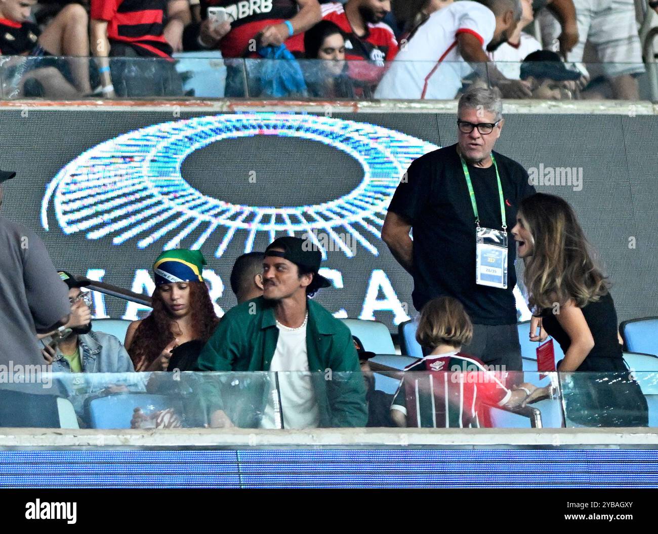 Rio de Janeiro-Brazil, October 17, 2024, singer Bruno Mars (green shirt ...
