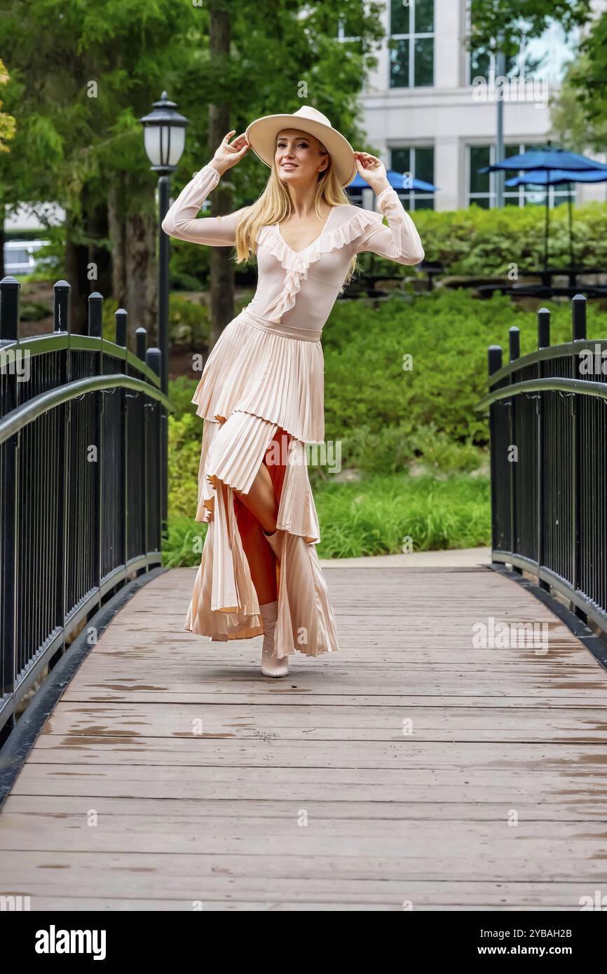 Fashionable female model beautifully showcases hi-res stock photography ...
