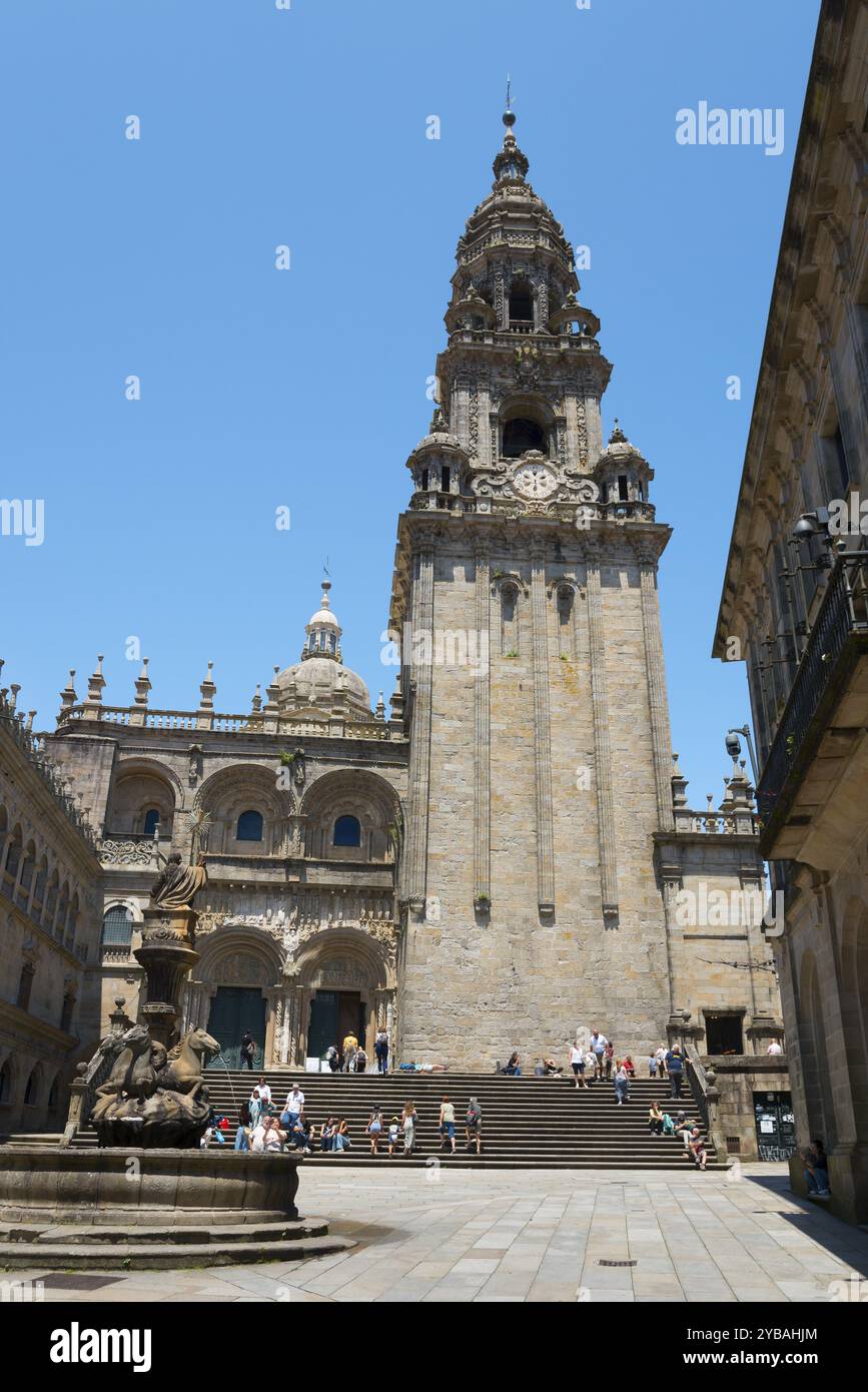 Impressive cathedral with high tower and wide staircase in the sunshine ...