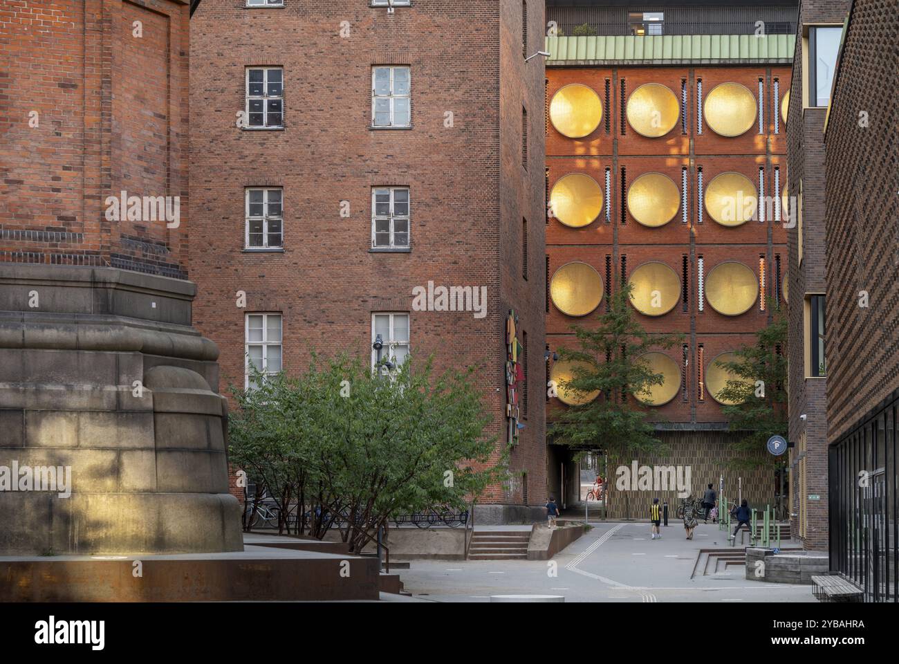 Inner courtyard with brick buildings and contemporary architecture ...