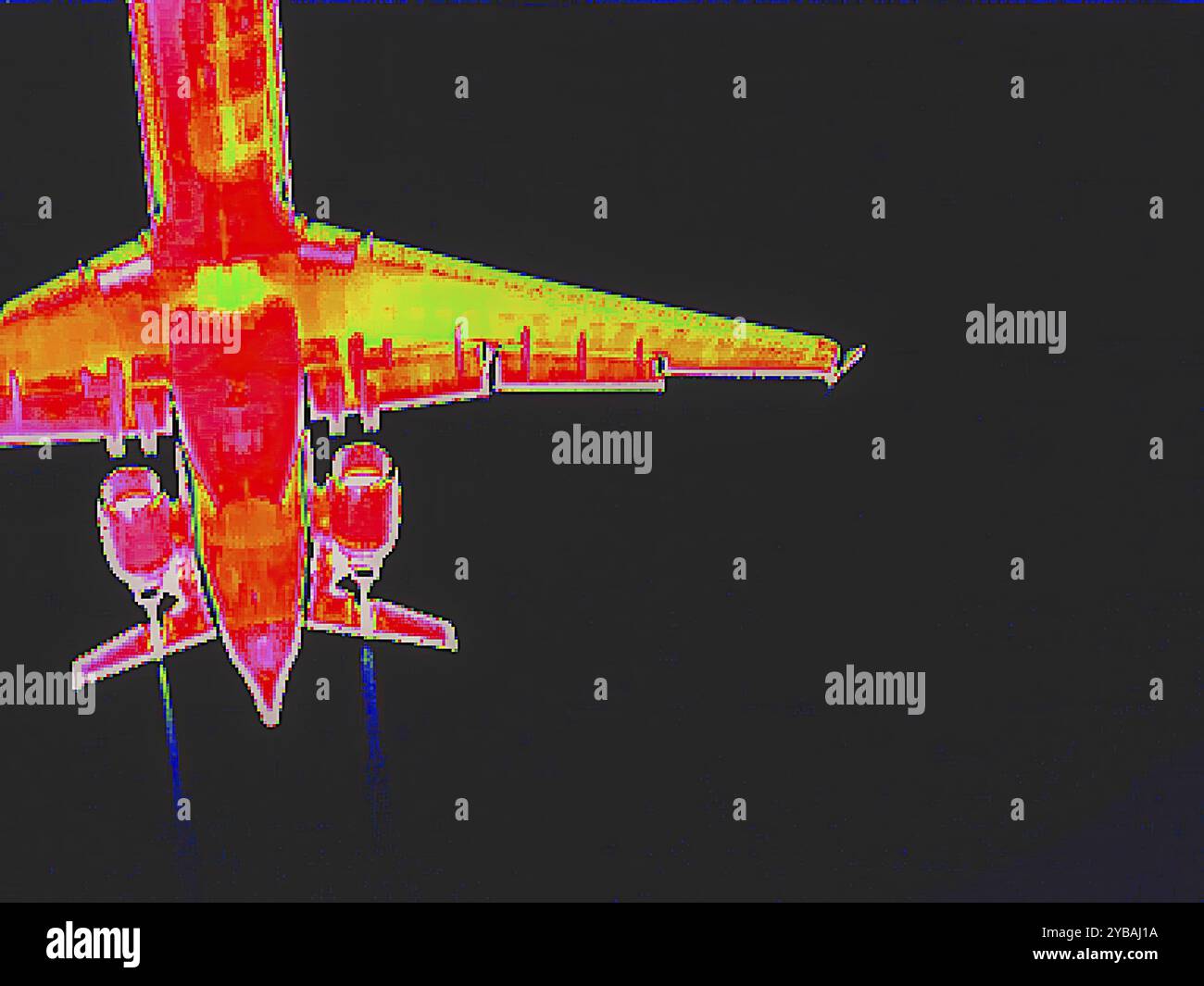 Aircraft on approach, bottom view. Thermal image or thermography ...