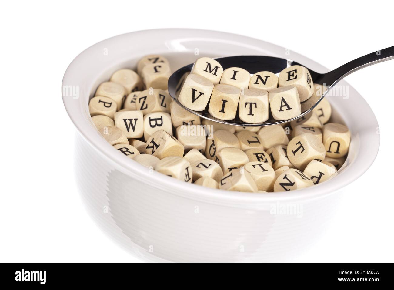Vitamin-rich alphabet soup, against a white background Stock Photo - Alamy