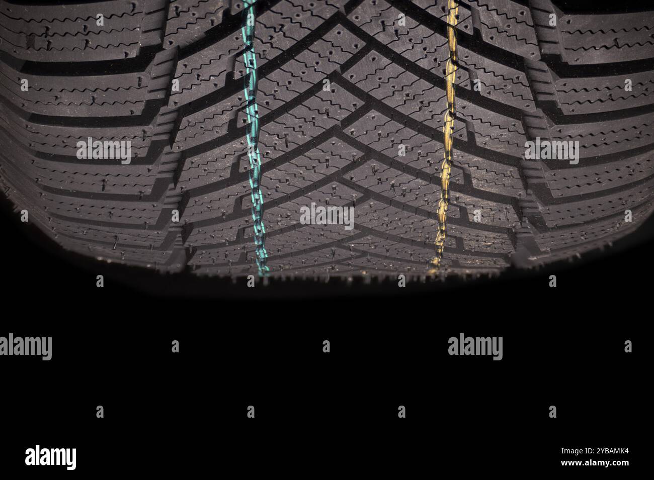 Detailed image of a car tire tread highlighting colorful markings ...