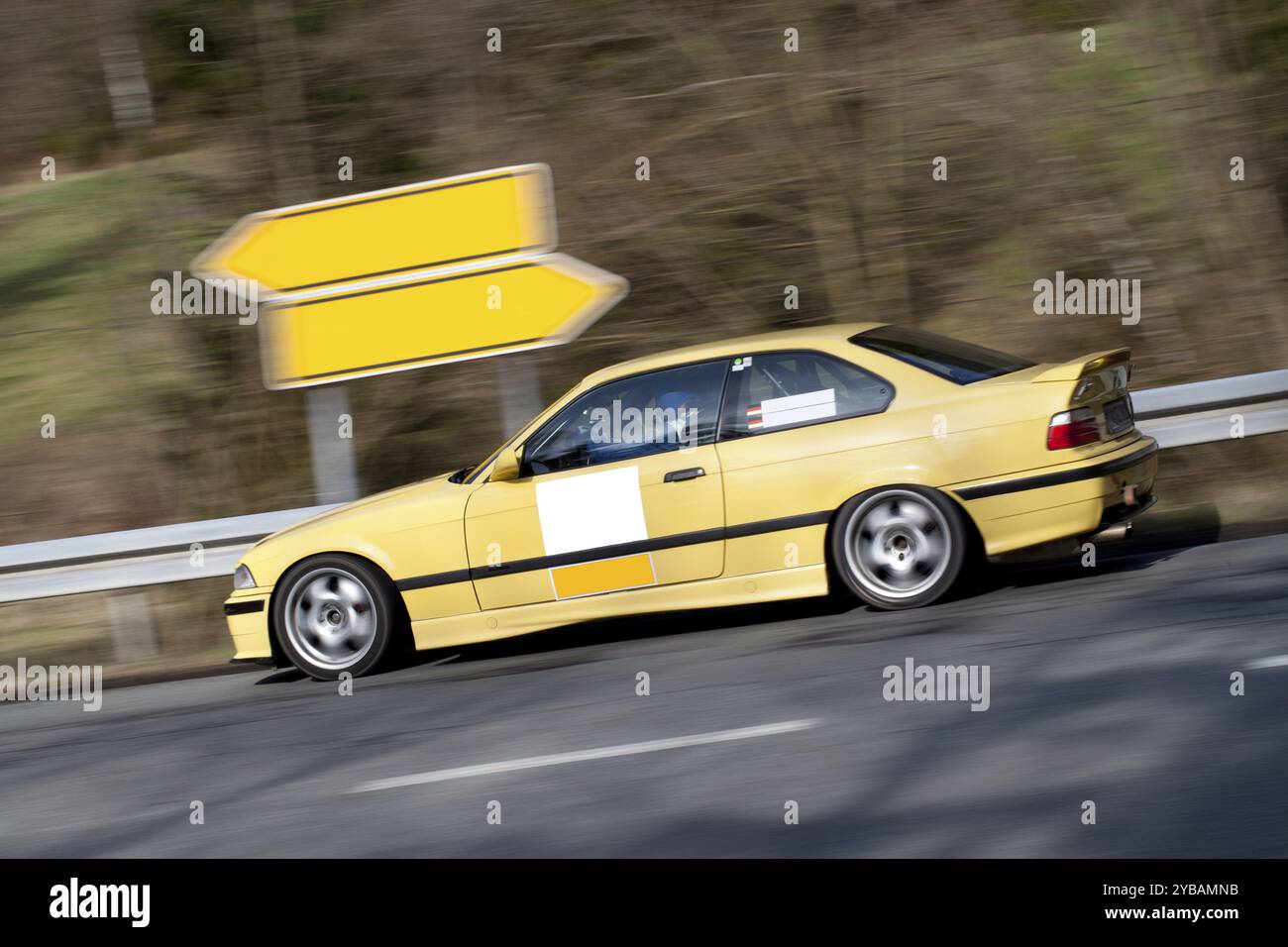 Cars driving on road past hi-res stock photography and images - Alamy