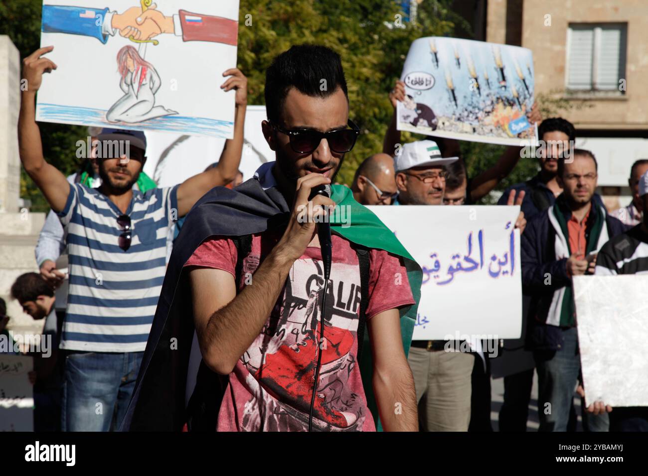 A group of Syrian activists living in Turkey protest in the town of ...