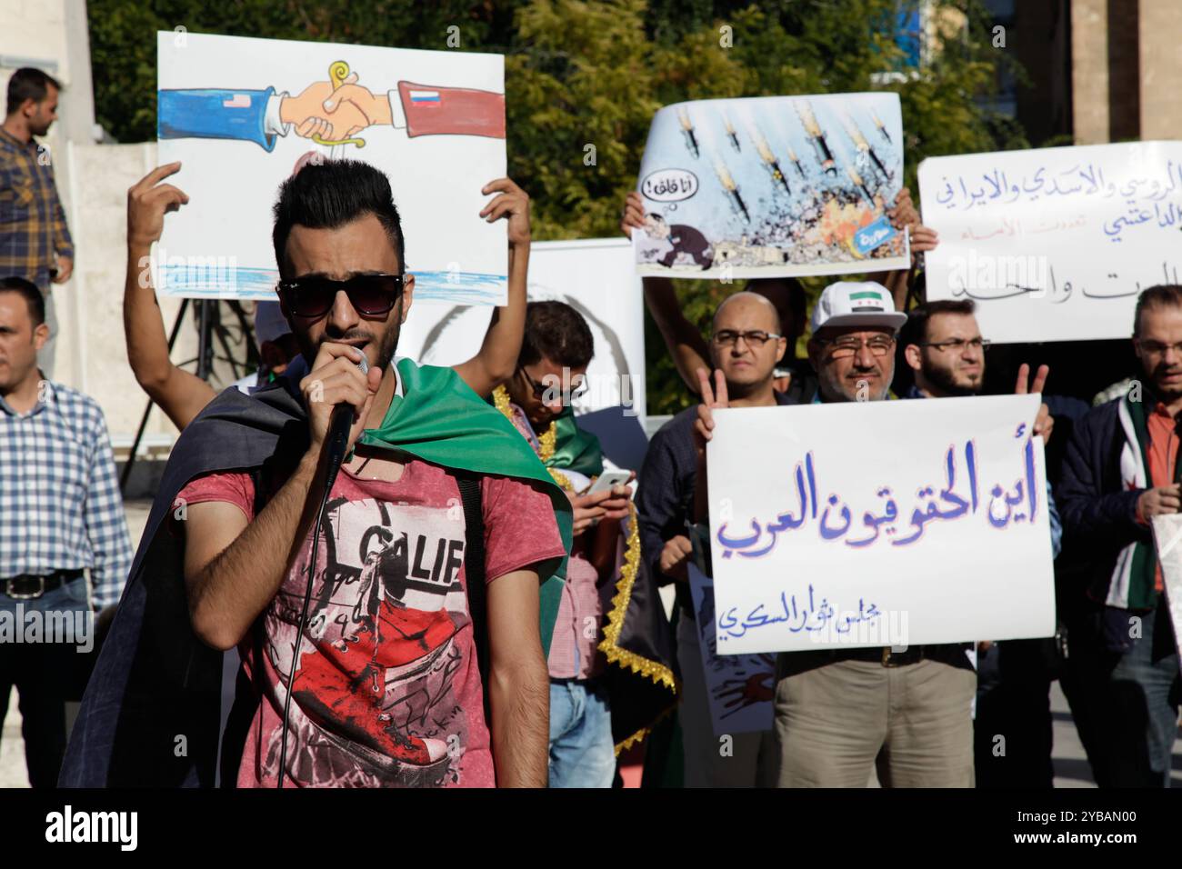 A group of Syrian activists living in Turkey protest in the town of ...