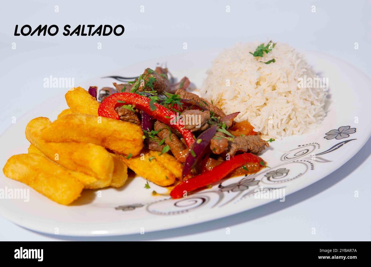 Comida peruana saltado de pescado hi-res stock photography and images ...