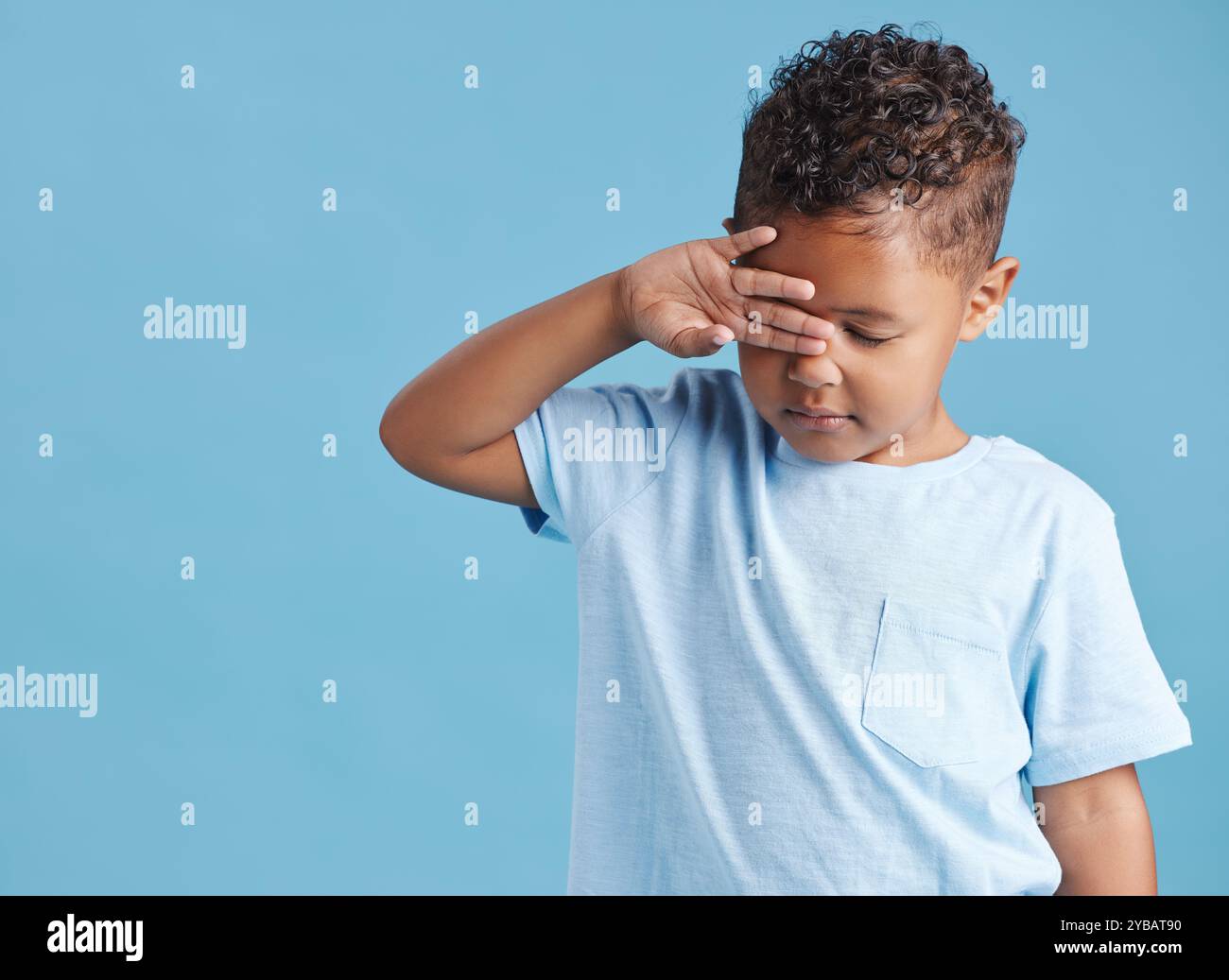 Tired, sad and tantrum with child in studio with tears for fear, stress ...