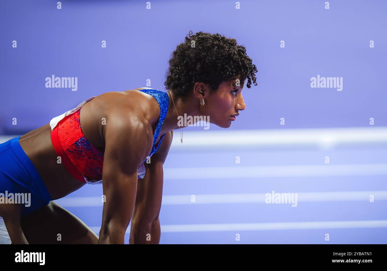 Anna Cockrell participating in the 400 meters hurdles at the Paris 2024 ...