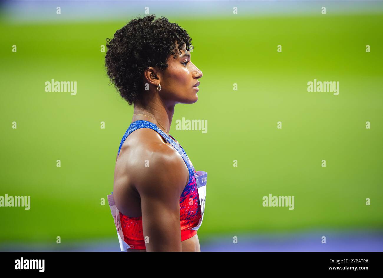 Anna Cockrell participating in the 400 meters hurdles at the Paris 2024 ...