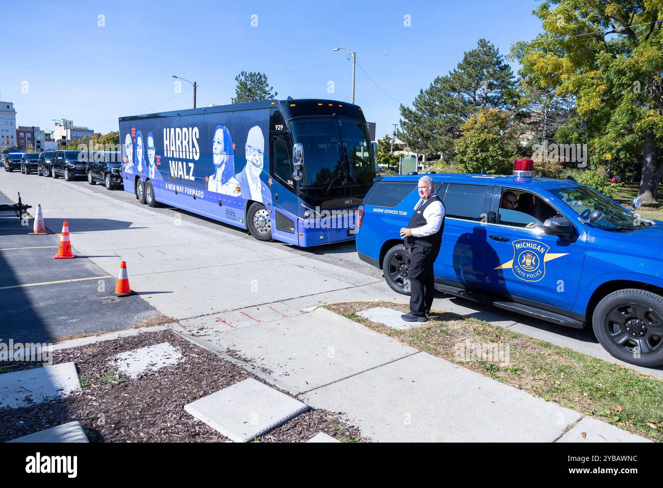 Flint, USA. 17th Oct, 2024. The bus for the "Driving Forward Blue Wall ...