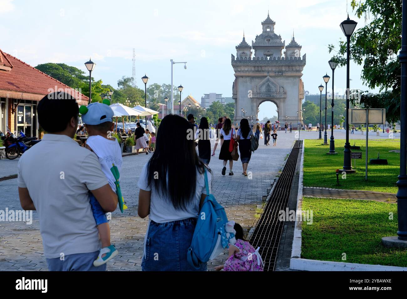 Visitors in Patuxay Park with Patuxay, the Victory Monument in the ...