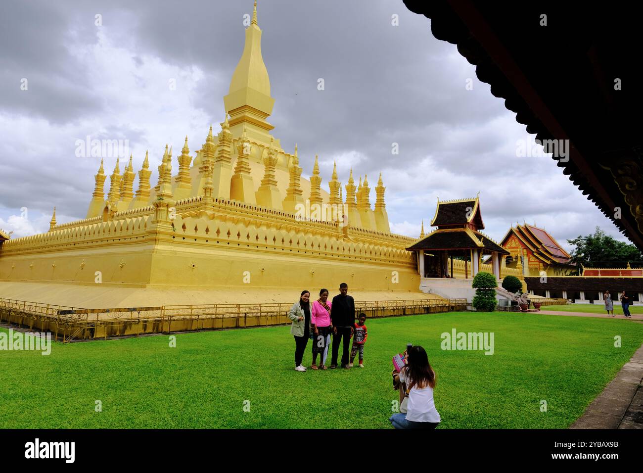 Tourists taking photos in front of Pha That Luang, 'Great Stupa' the ...
