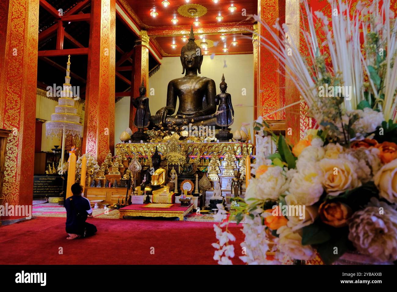 Phra Ong Teu, the large bronze Buddha statue accompanied by tow ...