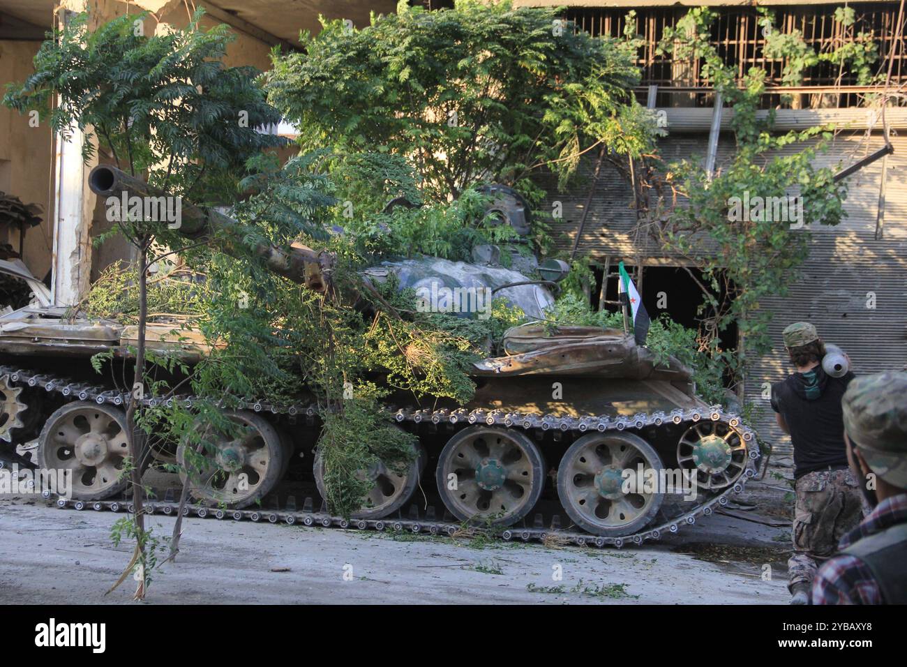 A Free Syrian Army tank during a heavy battle to break the siege of ...