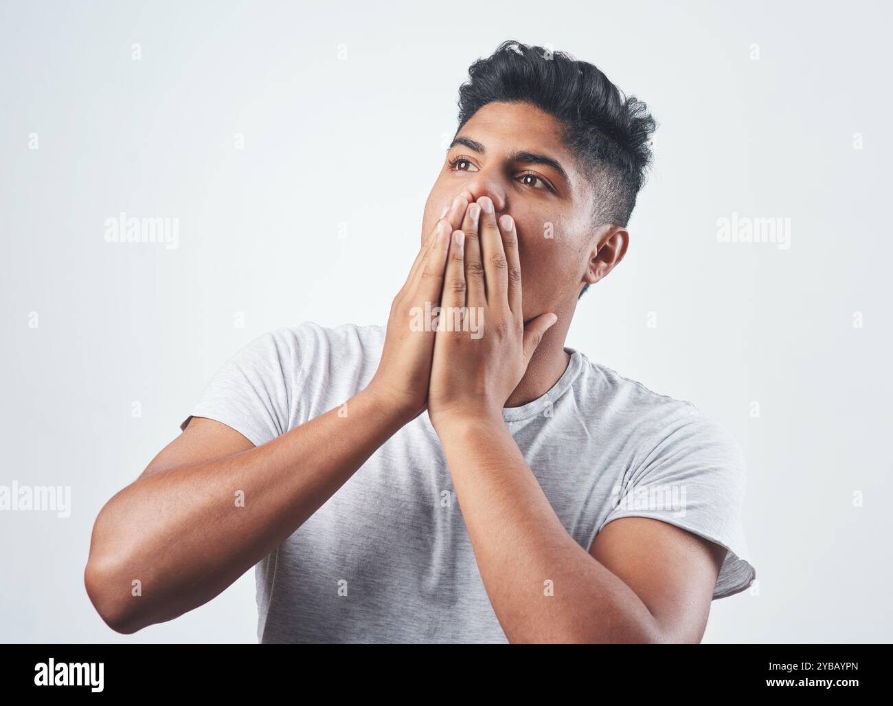 Man, hands and thinking with surprise in studio for announcement, omg ...