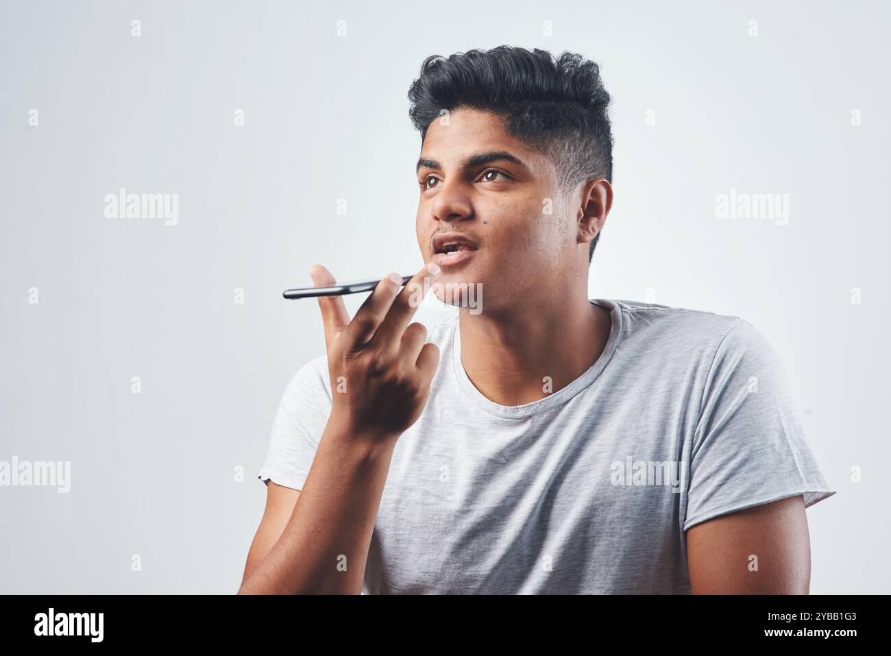 Indian man, discussion and speaker with phone for audio message, chat ...