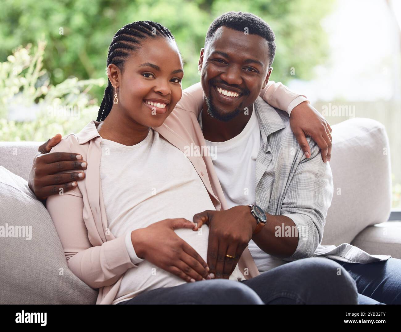 Black couple, pregnancy and heart hands on stomach for portrait ...