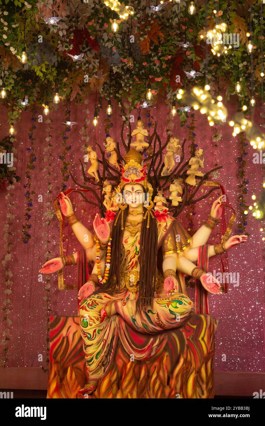 A beautiful idol of Maa Durga being worshipped at a pandal during ...