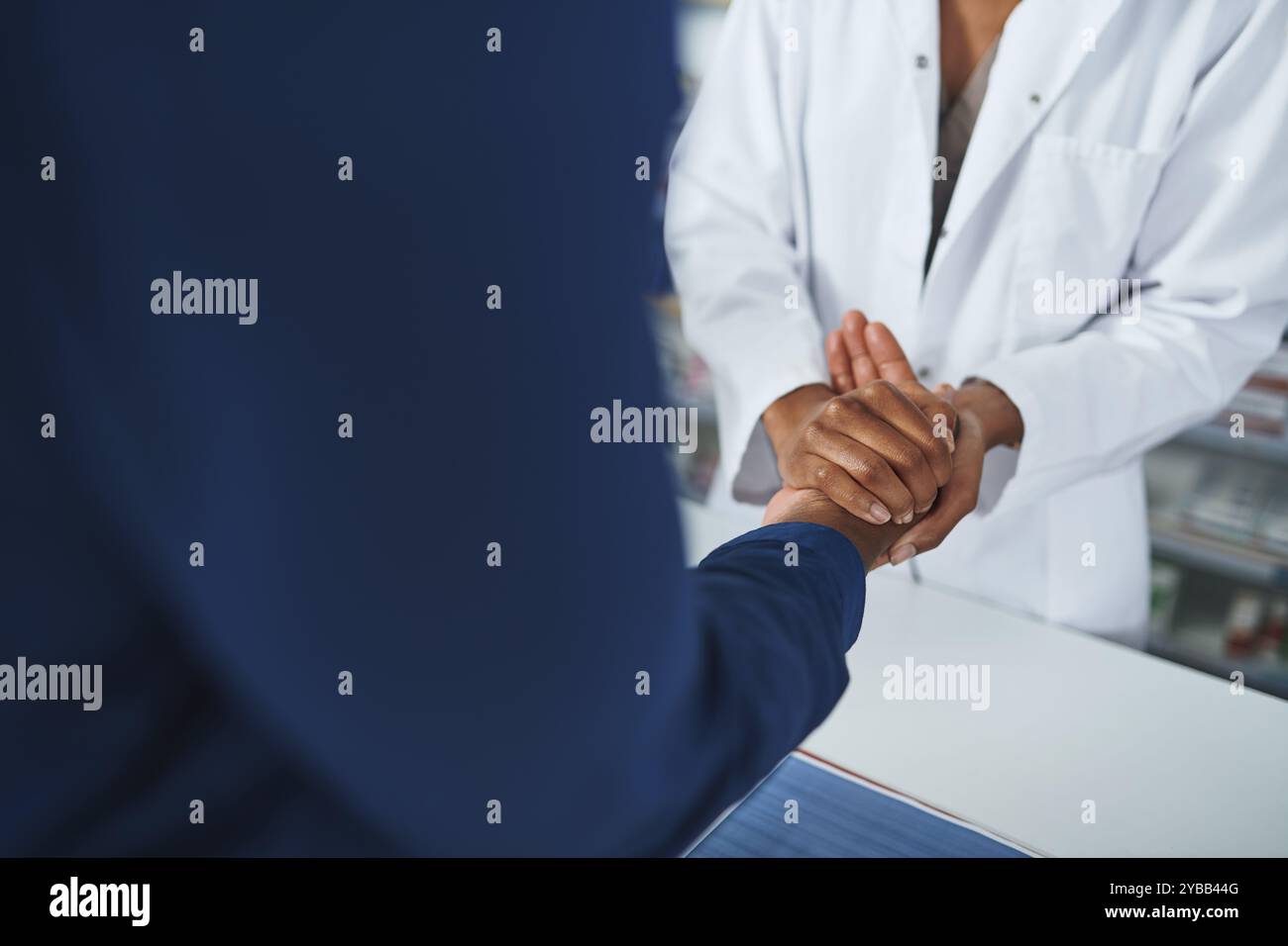Pharmacy, holding hands and pharmacist with customer for empathy for ...