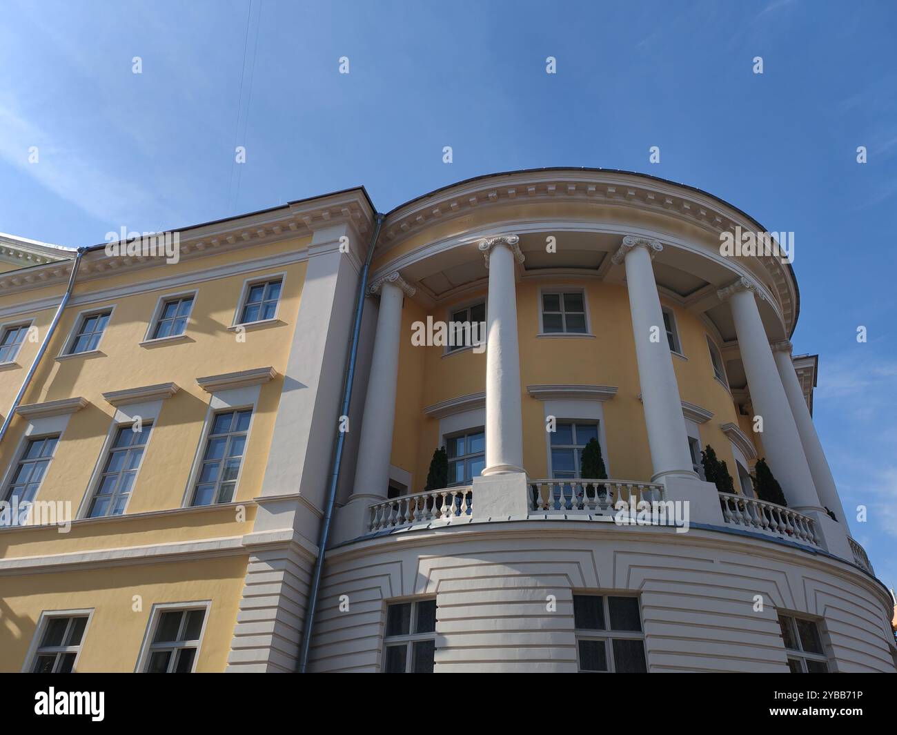 two-story classical building with intricate architectural details ...