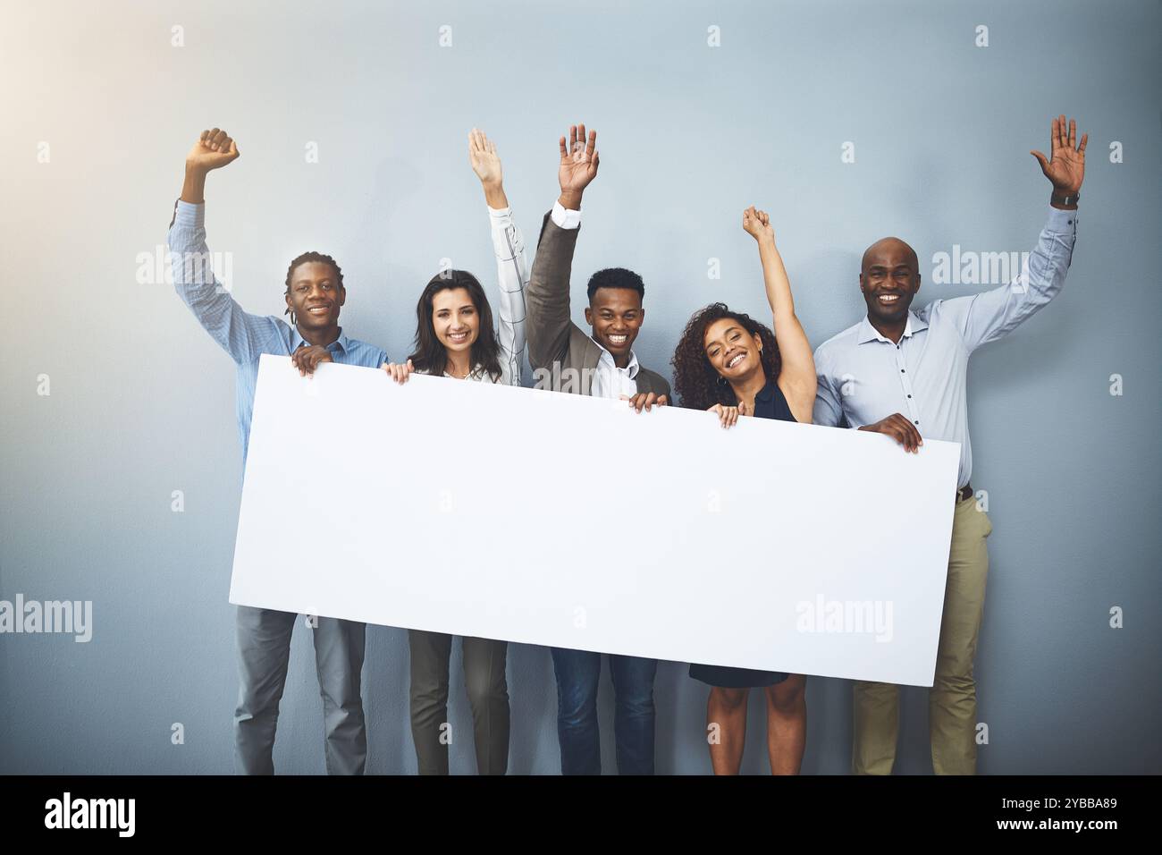 Business, people or celebration portrait with poster on gray background ...