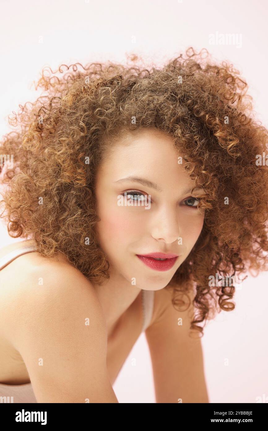 Attractive woman red lips curly hi-res stock photography and images - Alamy