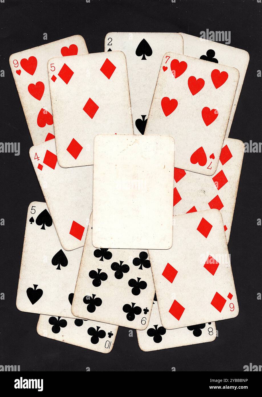 A montage of vintage playing cards with a blank card in the middle on a ...