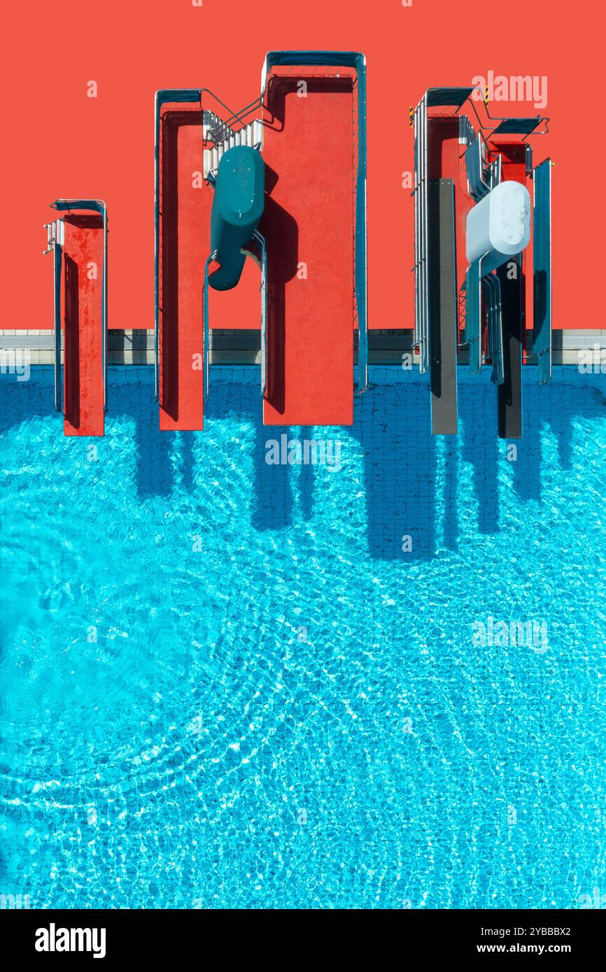 View from above red diving platforms and diving boards above sunny blue ...