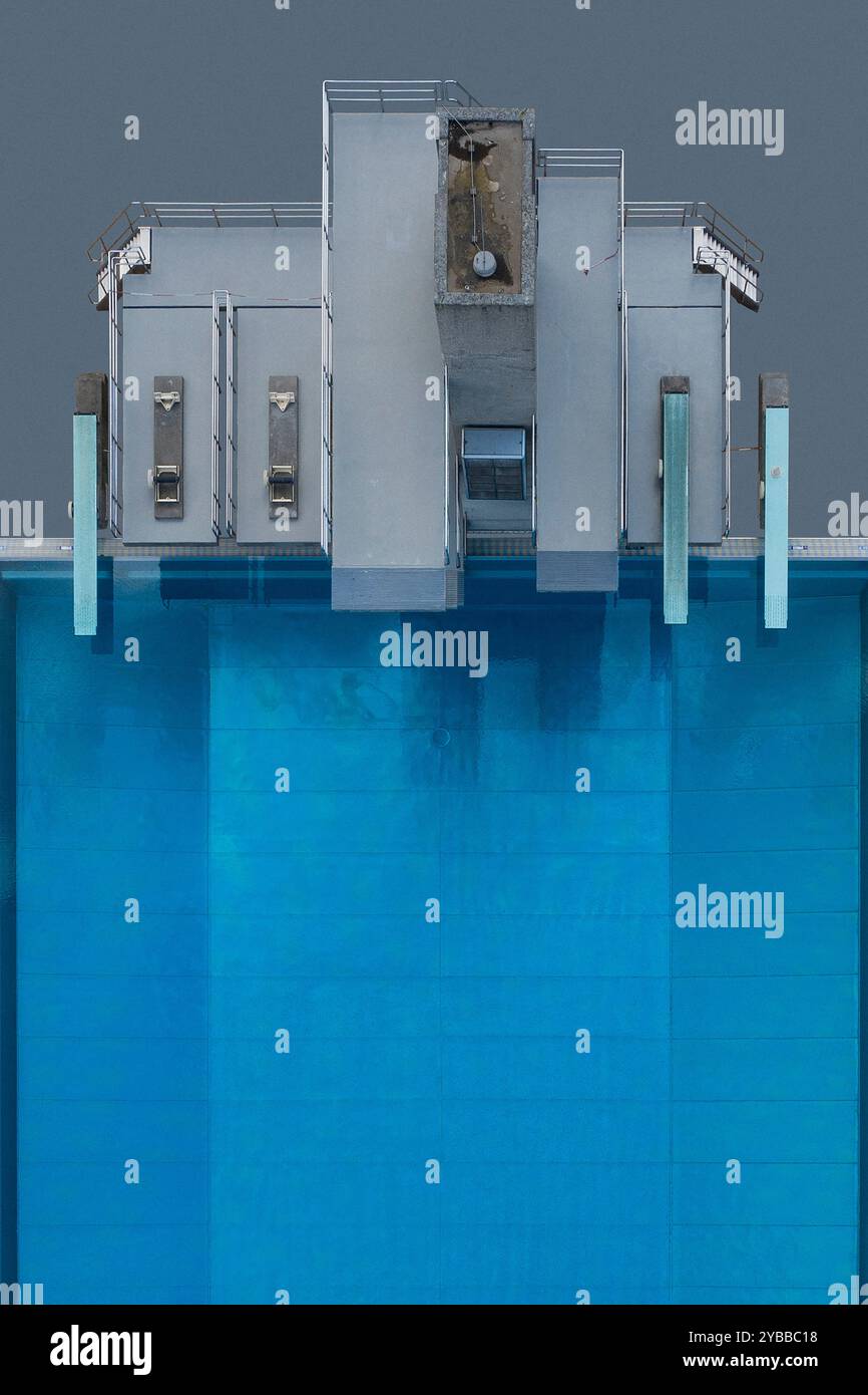 View from above diving platforms and diving boards above blue swimming ...
