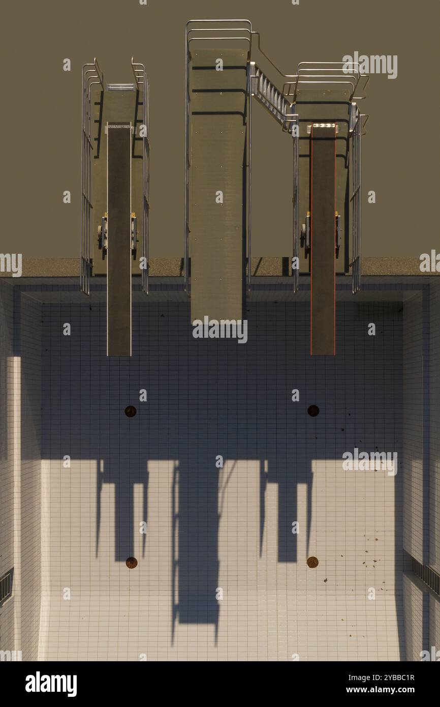 View from above diving platforms casting shadows over sunny, empty ...