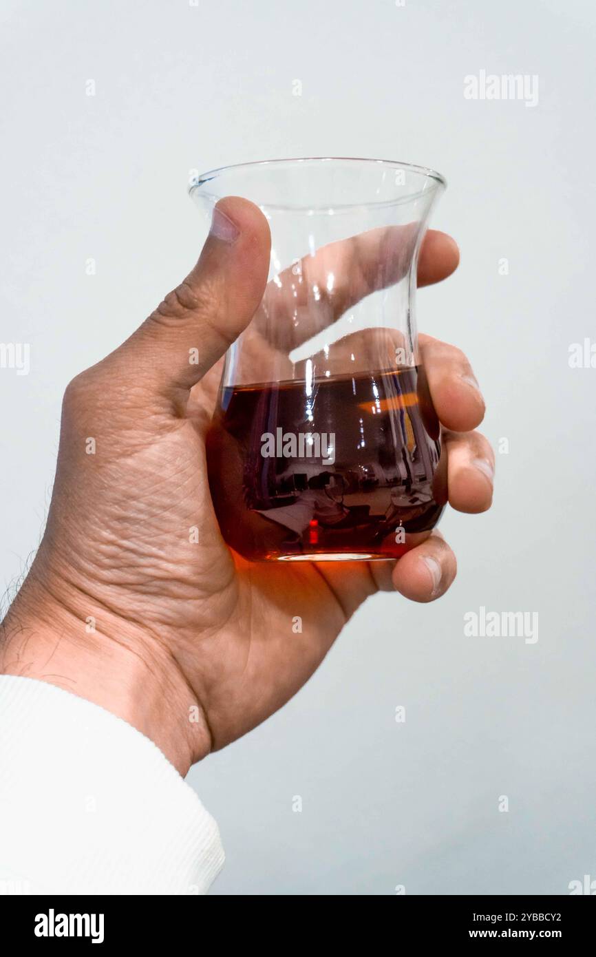 Black Turkish Tea In Armudu Glass Stock Photo - Alamy