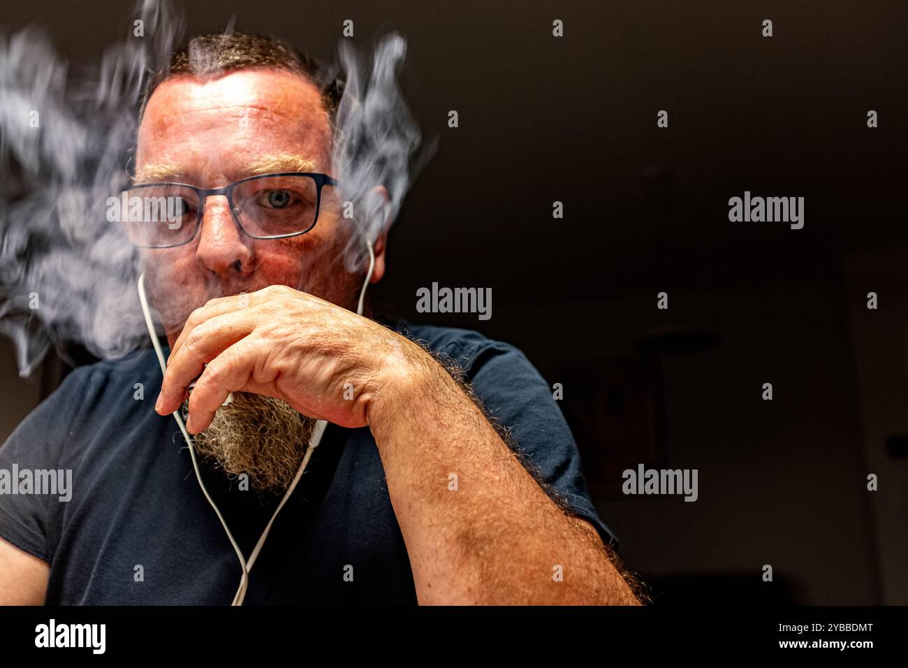 Selfie mature adult male vaping and smoking during the night. Oostende ...