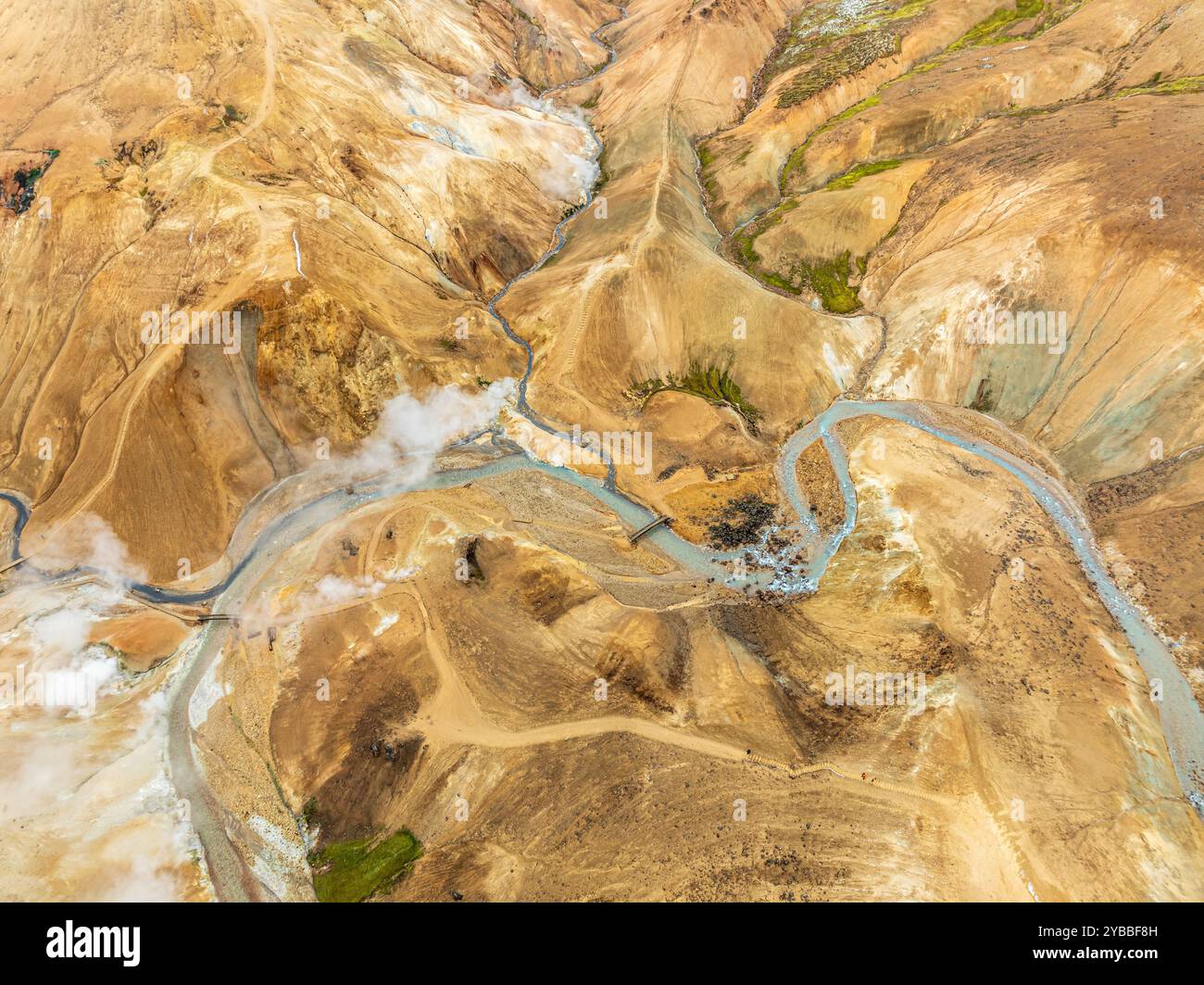 Steaming hot springs and colourful rhyolite mountains, aerial view ...