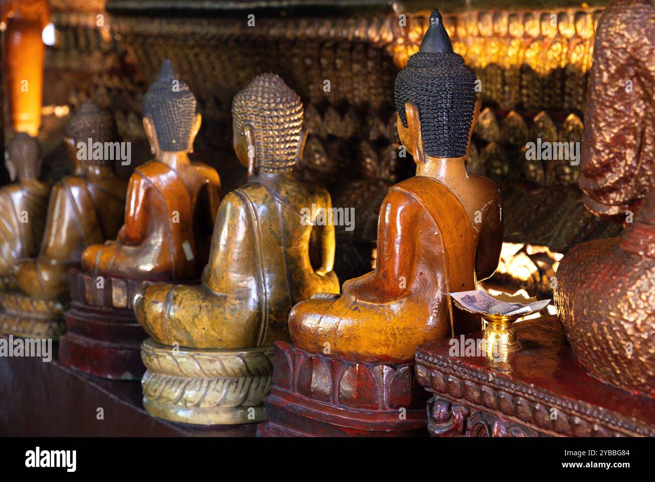 Buddha statues at Wat Phnom, Phnom Penh, Cambodia Stock Photo - Alamy