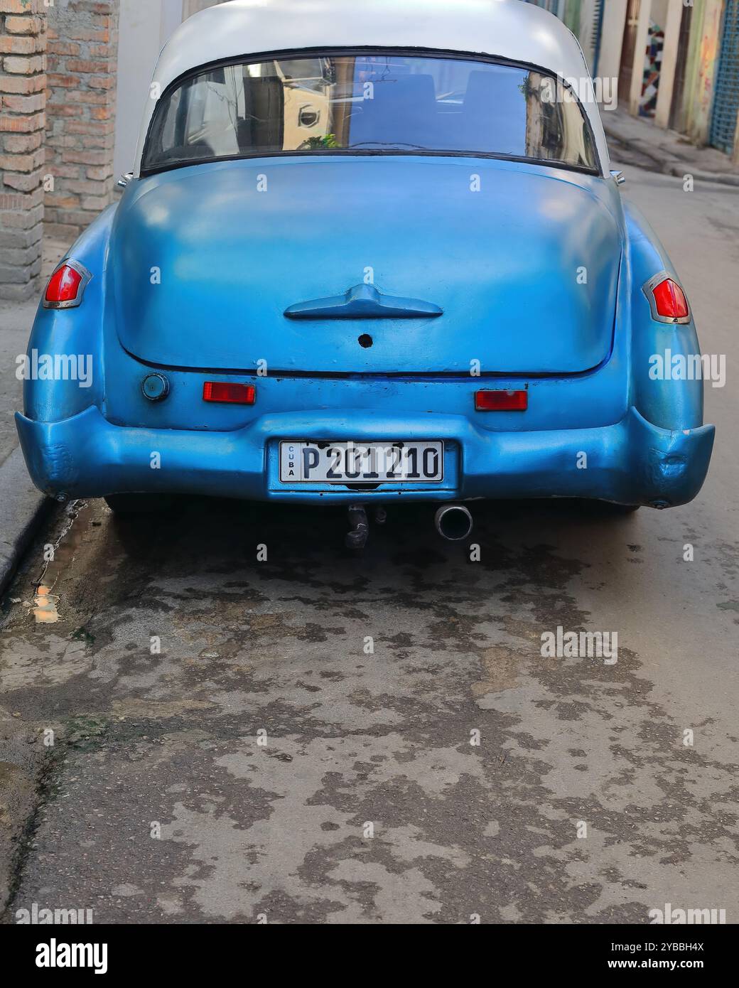 803 White-roofed blue American classic car -Buick 1949- stationed on ...