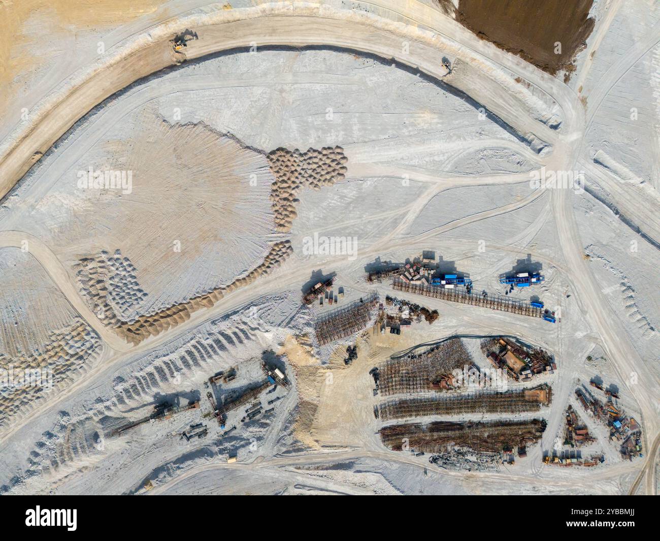 Construction of reinforced structures and buildings inside an open pit ...