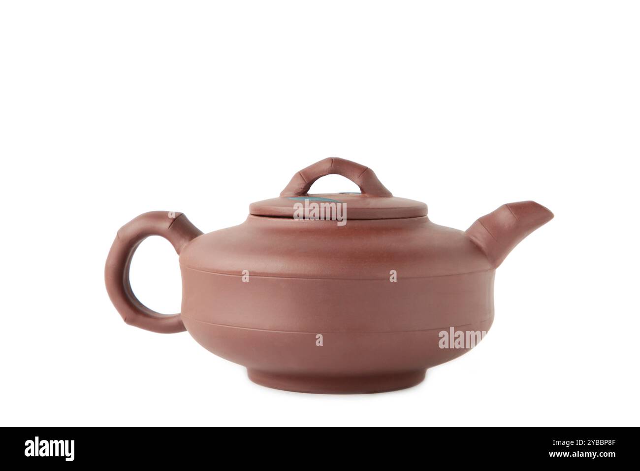 Clay teapot isolated on a white background. Top view Stock Photo - Alamy